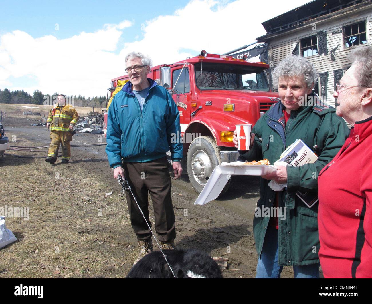 Dairy farmers Rosina Wallace, center, and her brother K. Alan Wallace ...