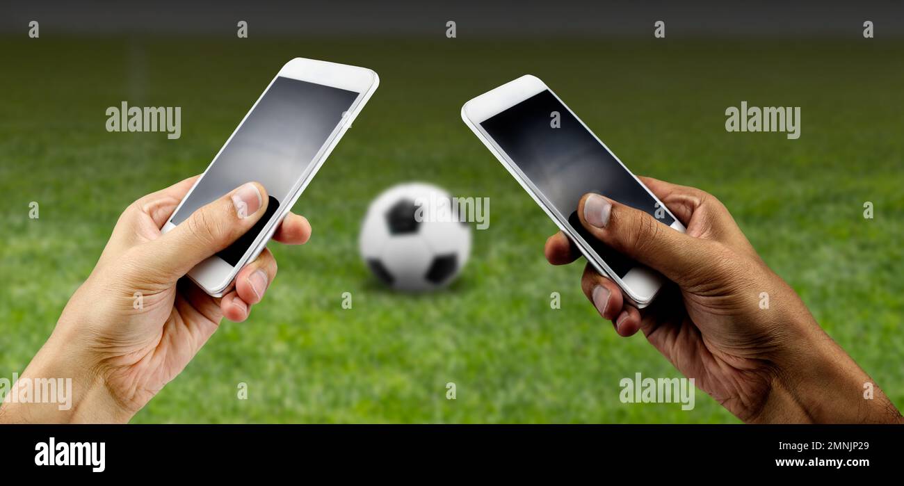 Two friends playing football hi-res stock photography and images - Alamy