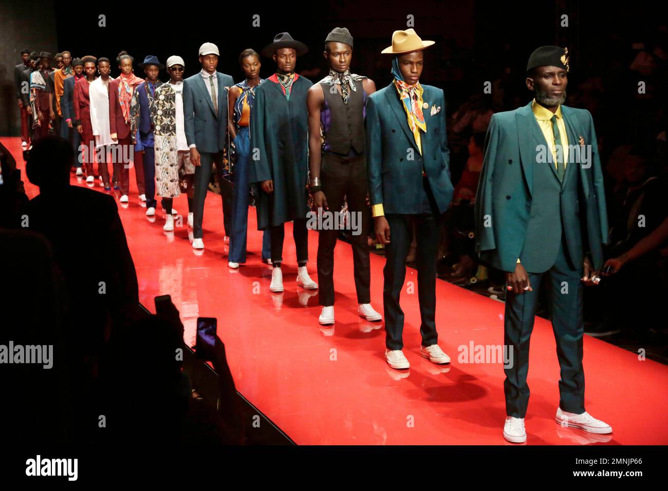 Models display an outfit by designer Ozwald Boateng during the ARISE ...