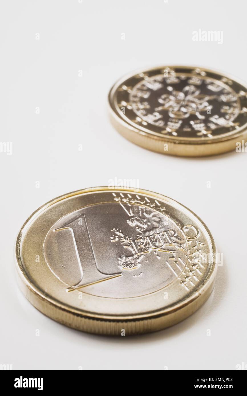 One Euro coins on white background Stock Photo - Alamy