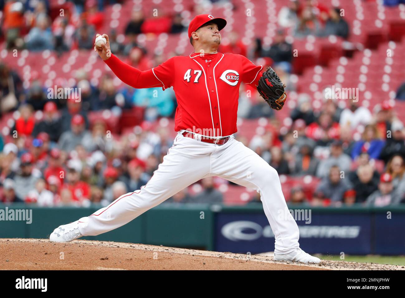 Cincinnati Reds starting pitcher Sal Romano throws in the third inning ...