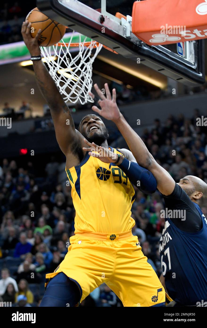 Utah Jazz's Jae Crowder, left, goes to the basket past Minnesota ...