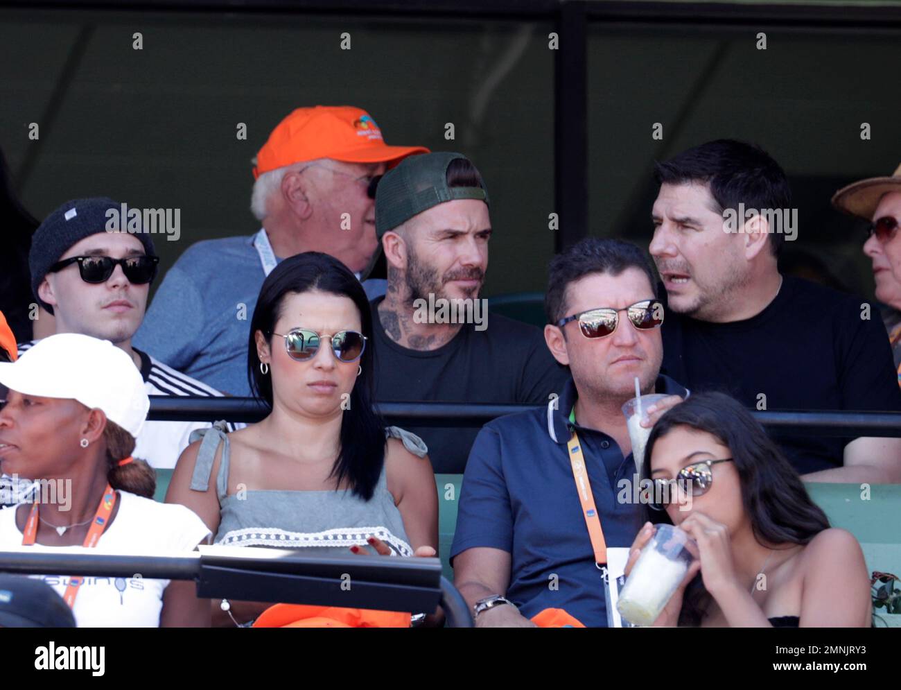 David Beckham, rear, center, sits with his son Brooklyn, left, and ...
