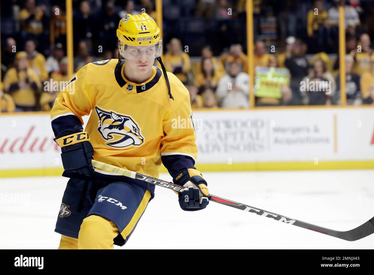 Nashville Predators right wing Eeli Tolvanen, of Finland, warms up ...