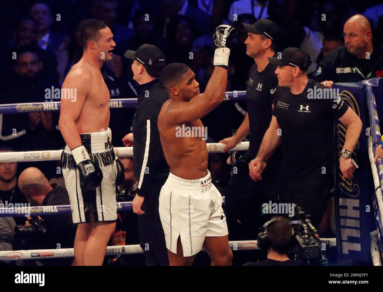 Britain's Anthony Joshua, centre, celebrates victory over New Zealand's ...