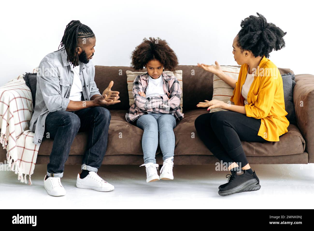 African American parents sort things out with their preschool daughter ...