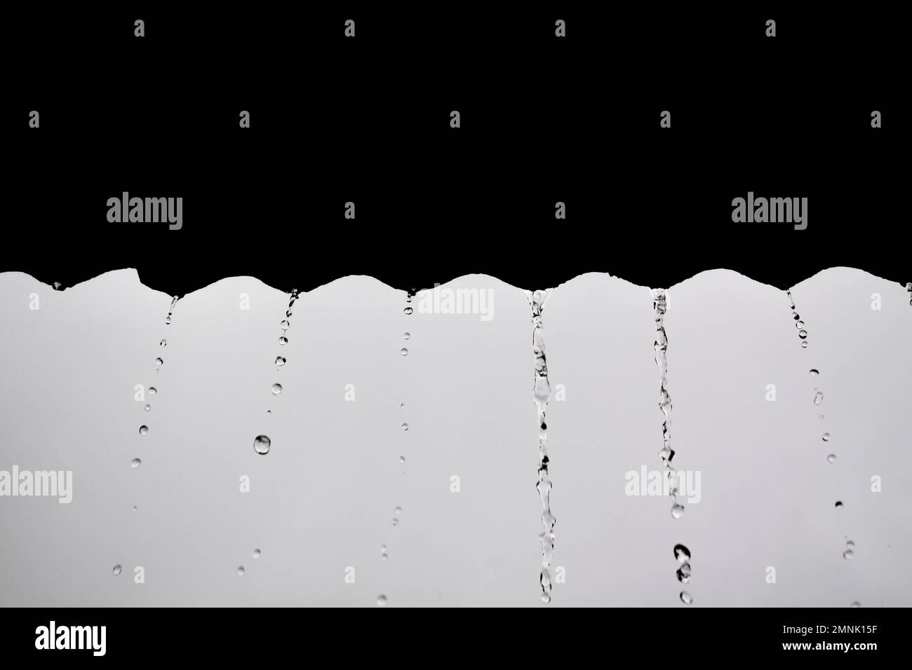 Close-up drops of rain fall from the roof, in the rainy season Stock ...