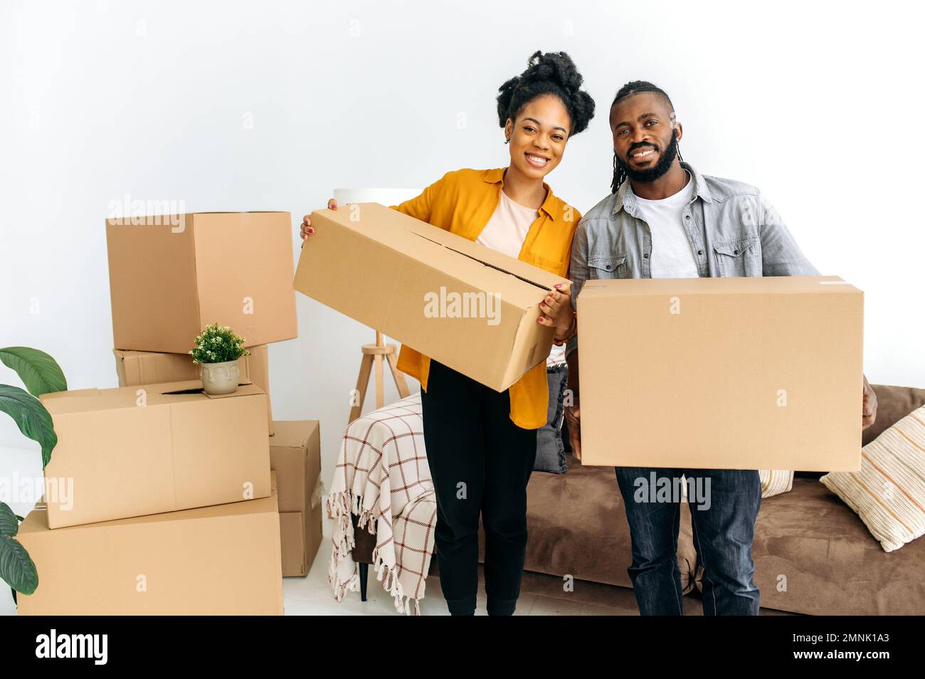 Moving to a new apartment. Happy newlyweds bought their first home ...