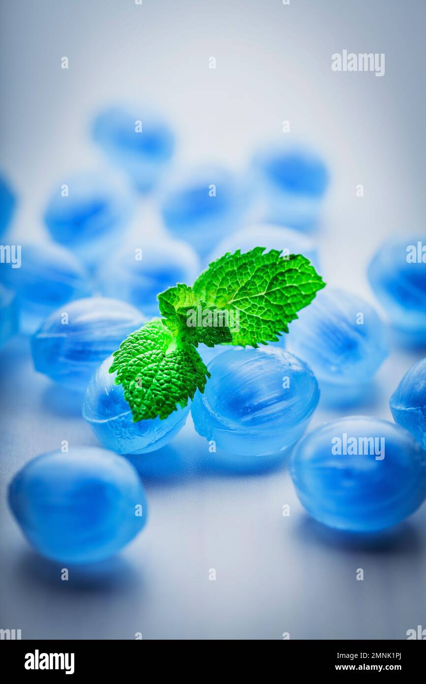 Blue menthol fresh balsamic syrup with mint leaves on a white ...