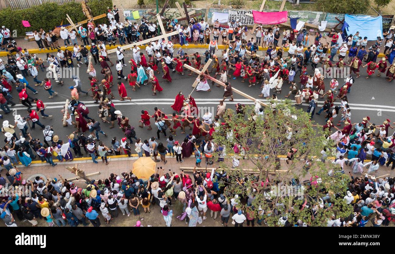 A Via Crucis, or Way of the Cross procession makes its way through the ...