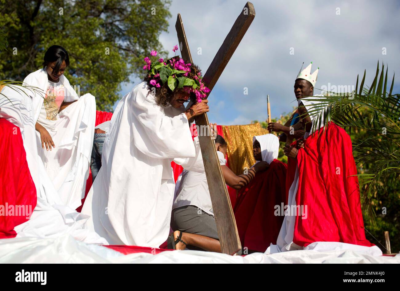 Haitians depict the fourth station in the Way of the Cross reenactment ...
