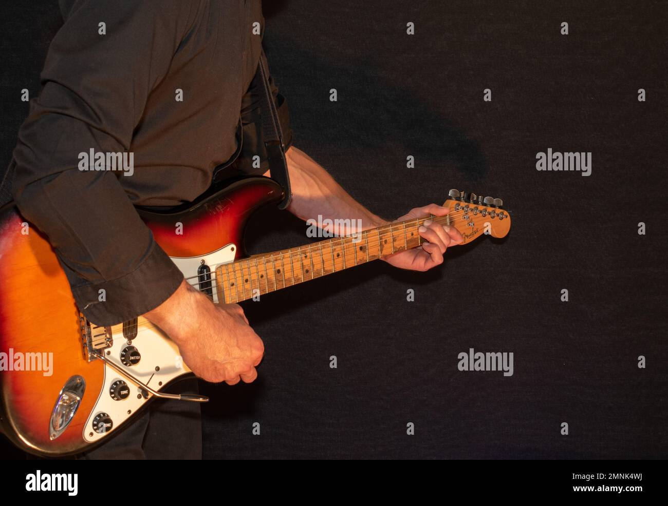 Vaduz, Liechtenstein, September 28, 2022 Musician plays a Fender ...