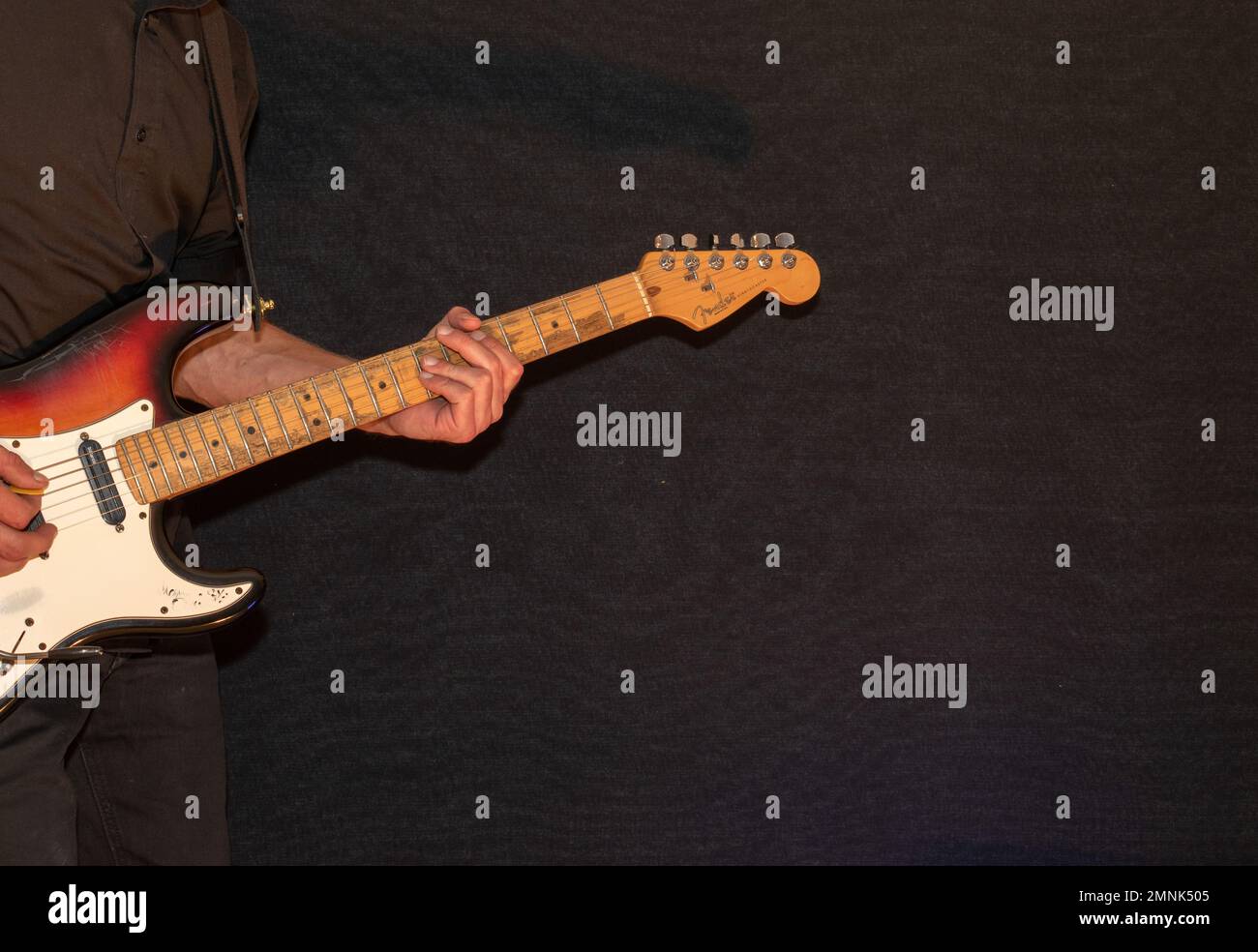 Vaduz, Liechtenstein, September 28, 2022 Musician plays a Fender ...