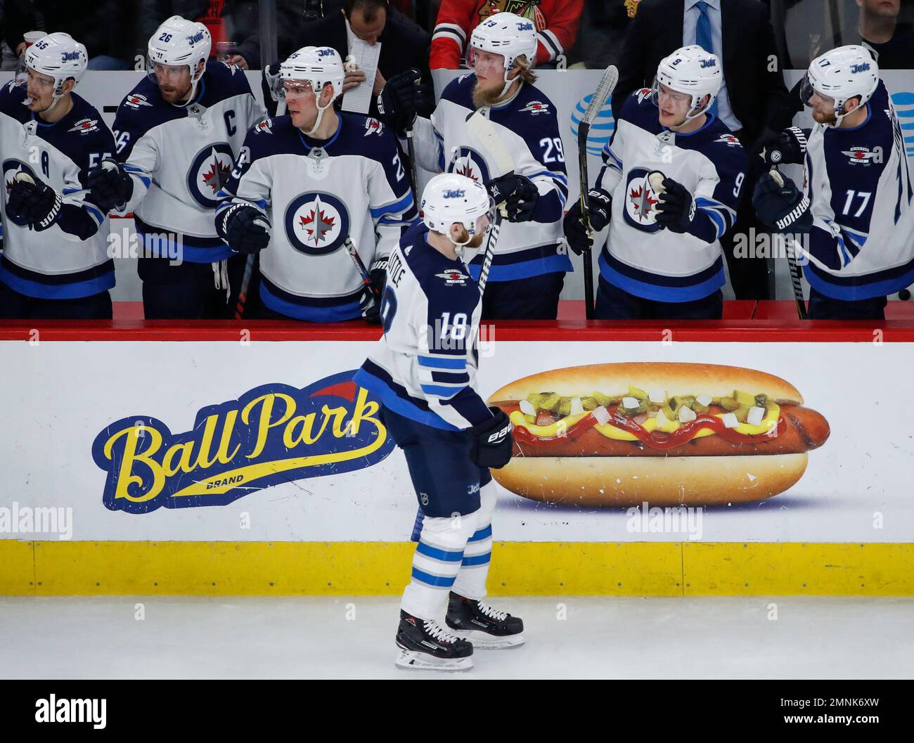 Winnipeg Jets center Bryan Little celebrates with teammates after ...