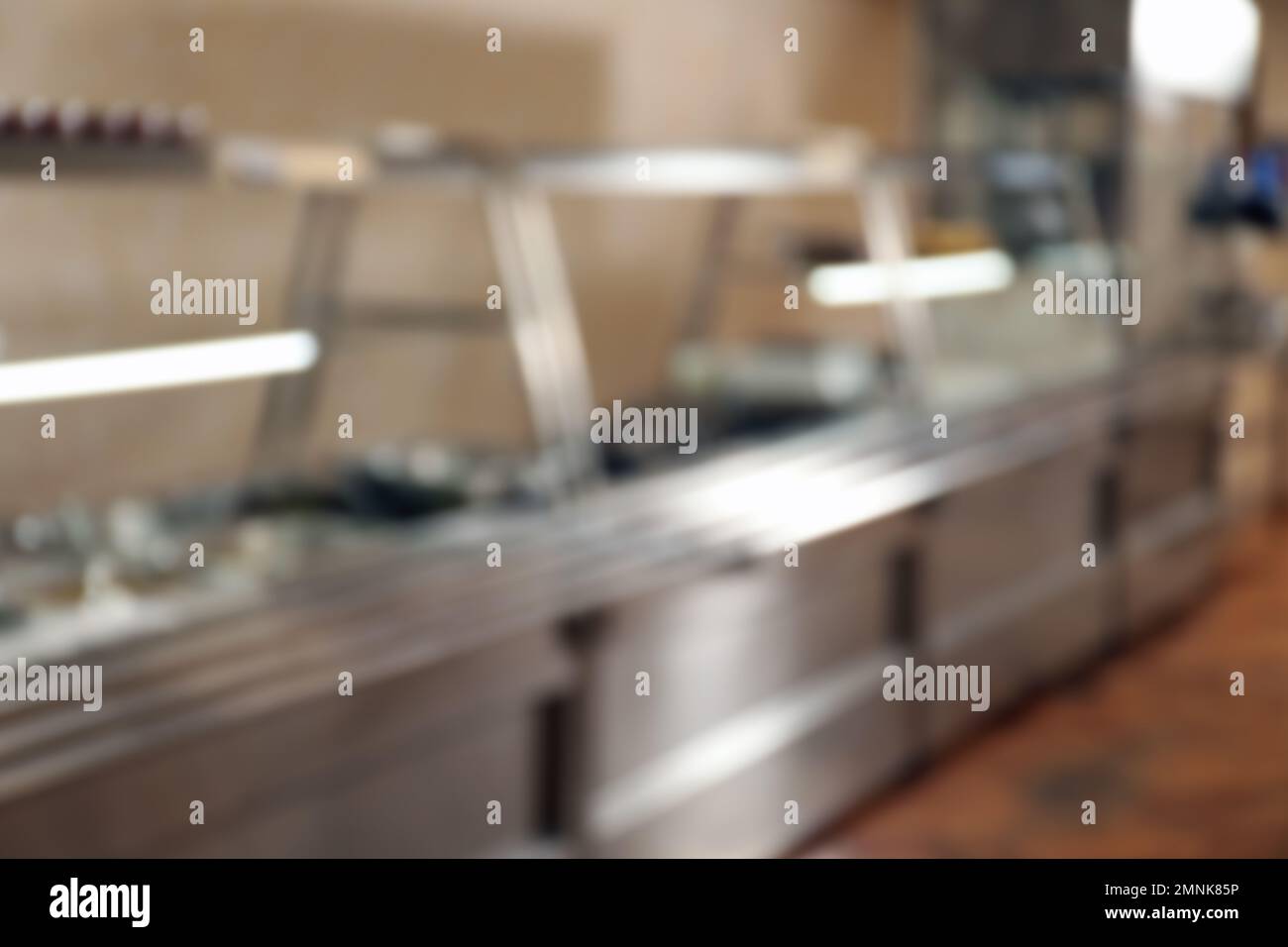 Blurred view of serving line with food in school canteen Stock Photo ...