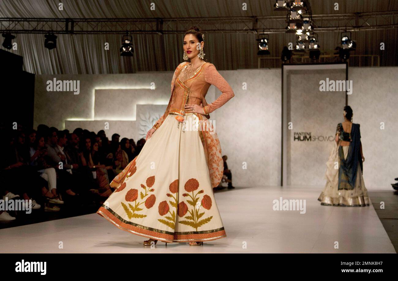 Models present creation by Pakistani designer Faiza Samee during the ...