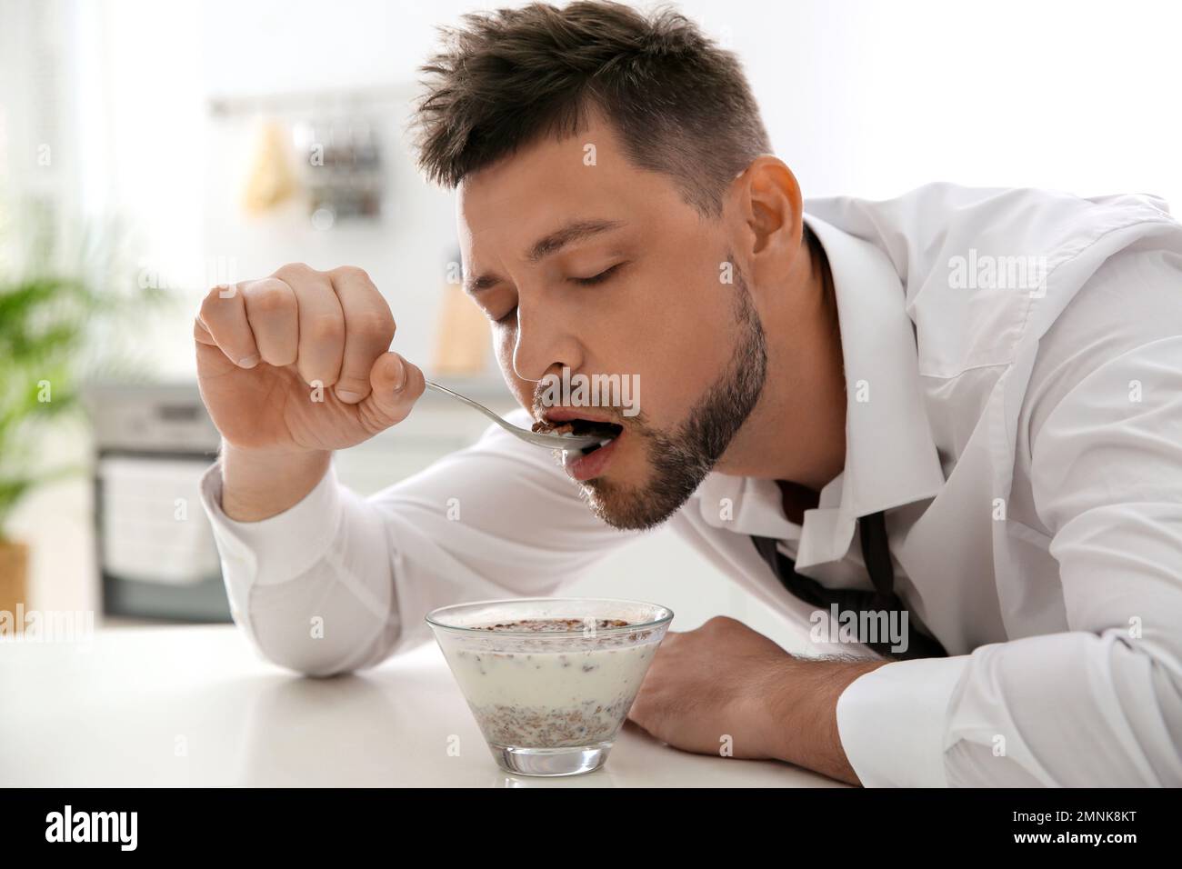 Eating desk work breakfast hi-res stock photography and images - Alamy