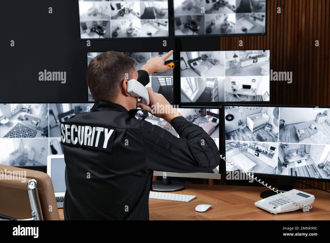 Security guard talking hi-res stock photography and images - Alamy
