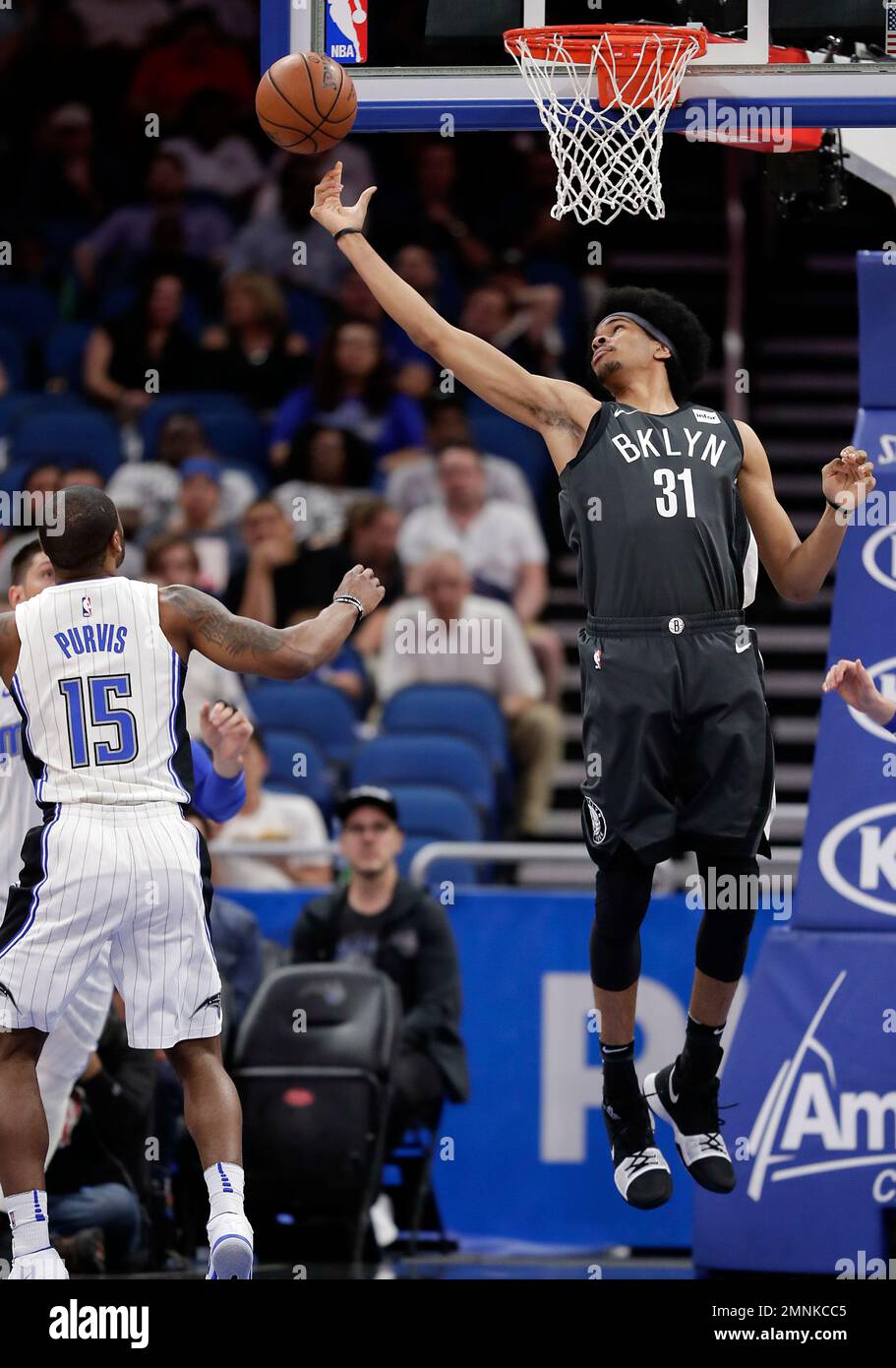 Brooklyn Nets' Jarrett Allen (31) grabs an offensive rebound in front ...