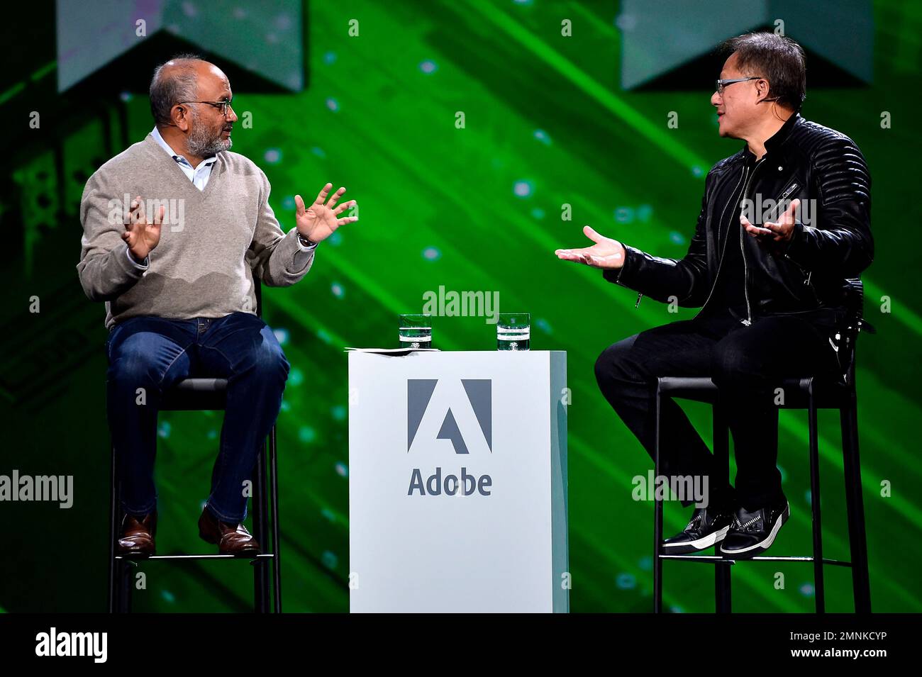 IMAGE DISTRIBUTED FOR ADOBE - Adobe CEO Shantanu Narayen (L) explores ...