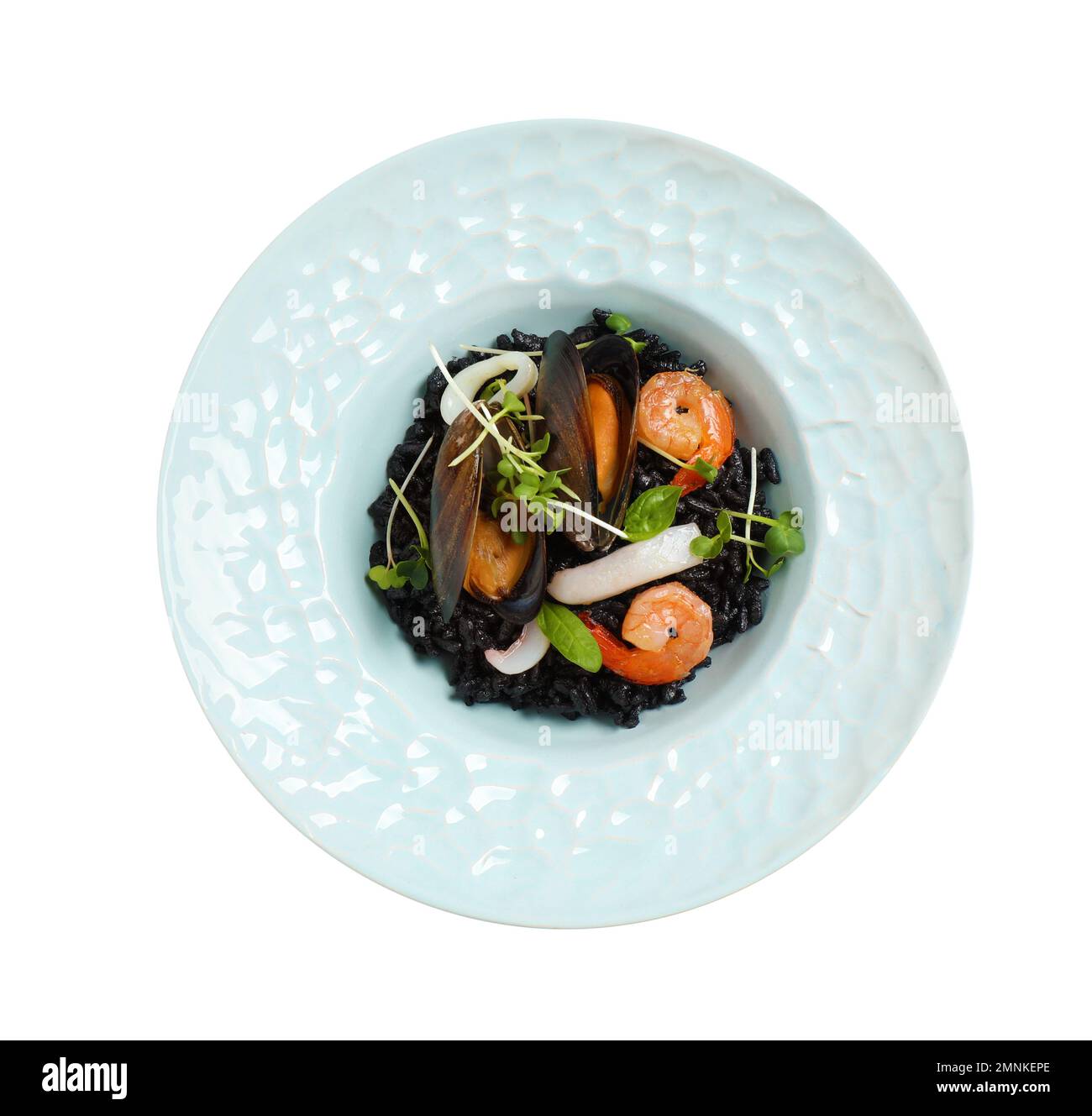 Delicious black risotto with seafood isolated on white, top view Stock ...