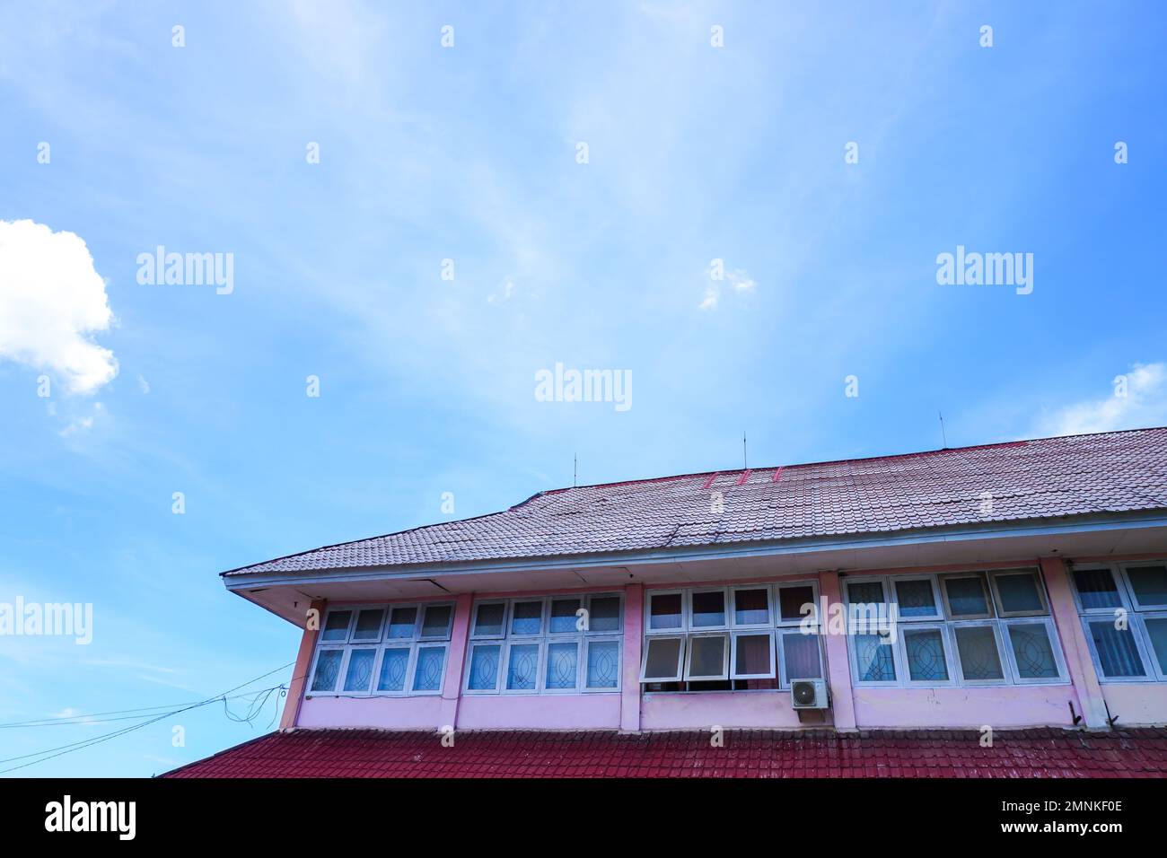 Old school building on blue sky background with copy space Stock Photo ...