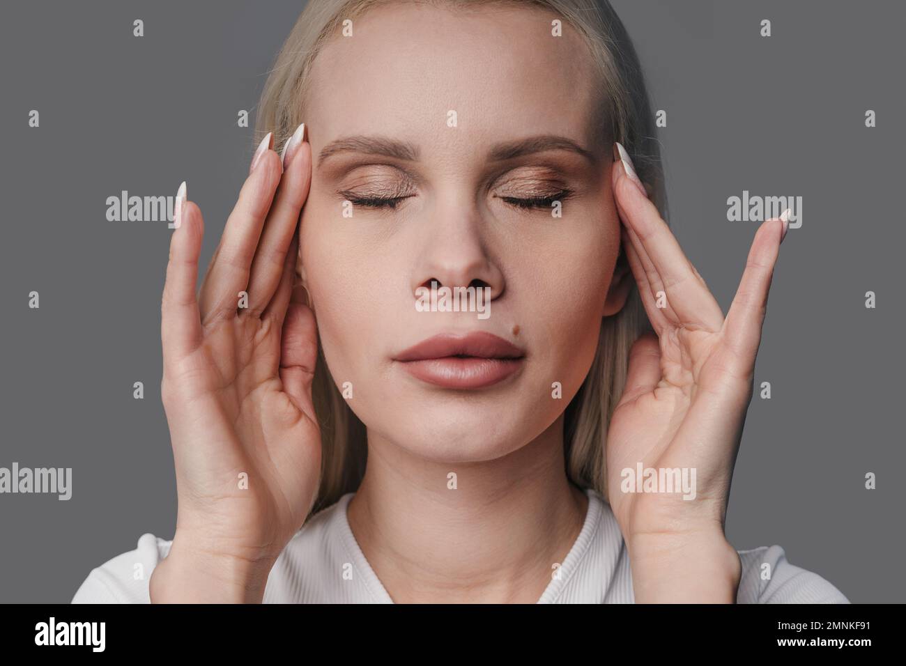 Temples touching hi-res stock photography and images - Alamy