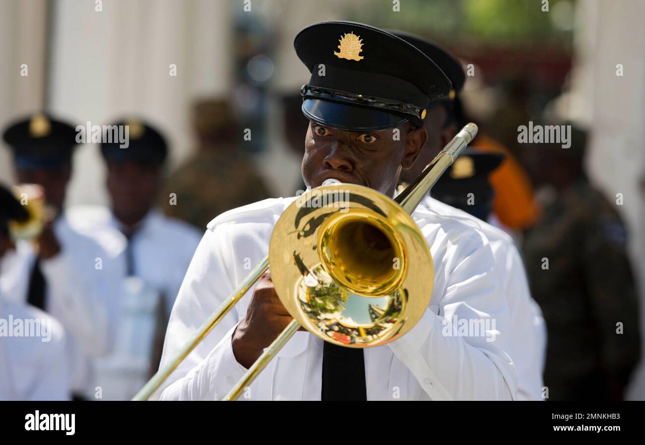 A military musician plays during a ceremony presenting the leadership ...
