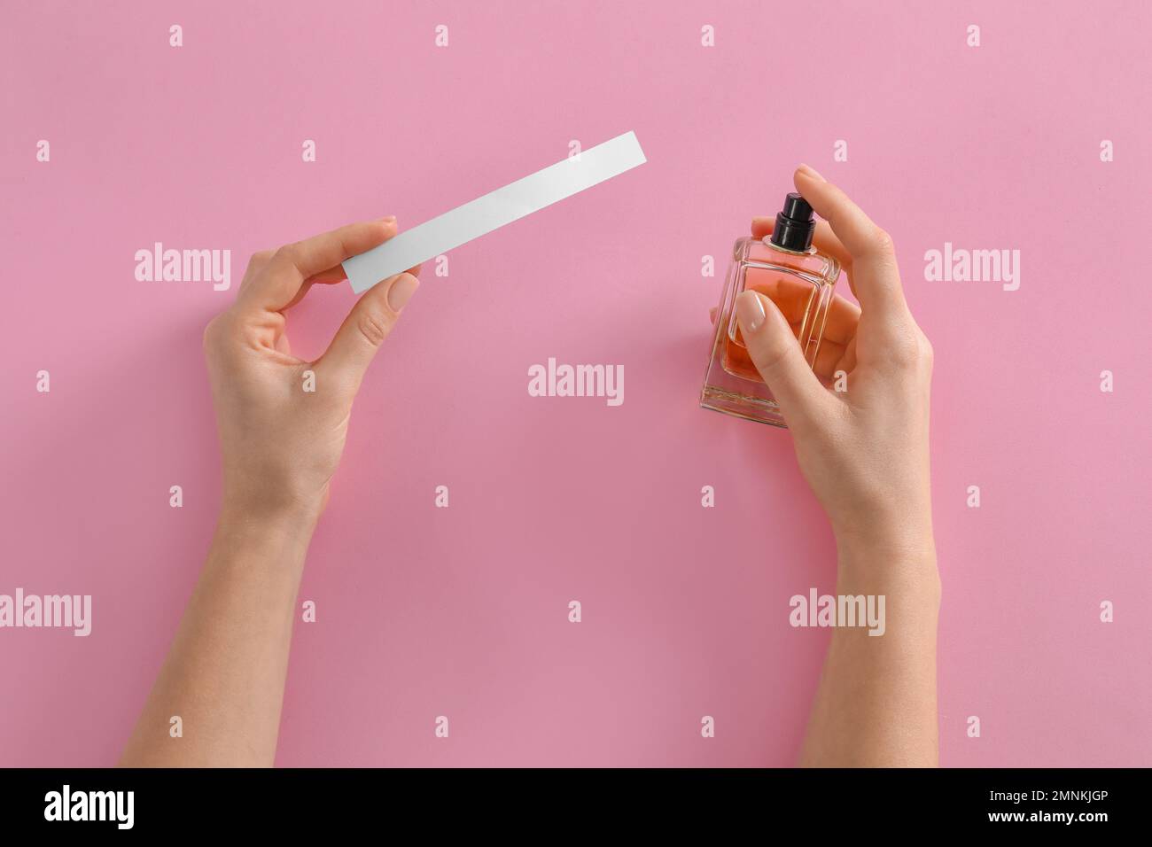 Woman spray perfume tester hi-res stock photography and images - Alamy