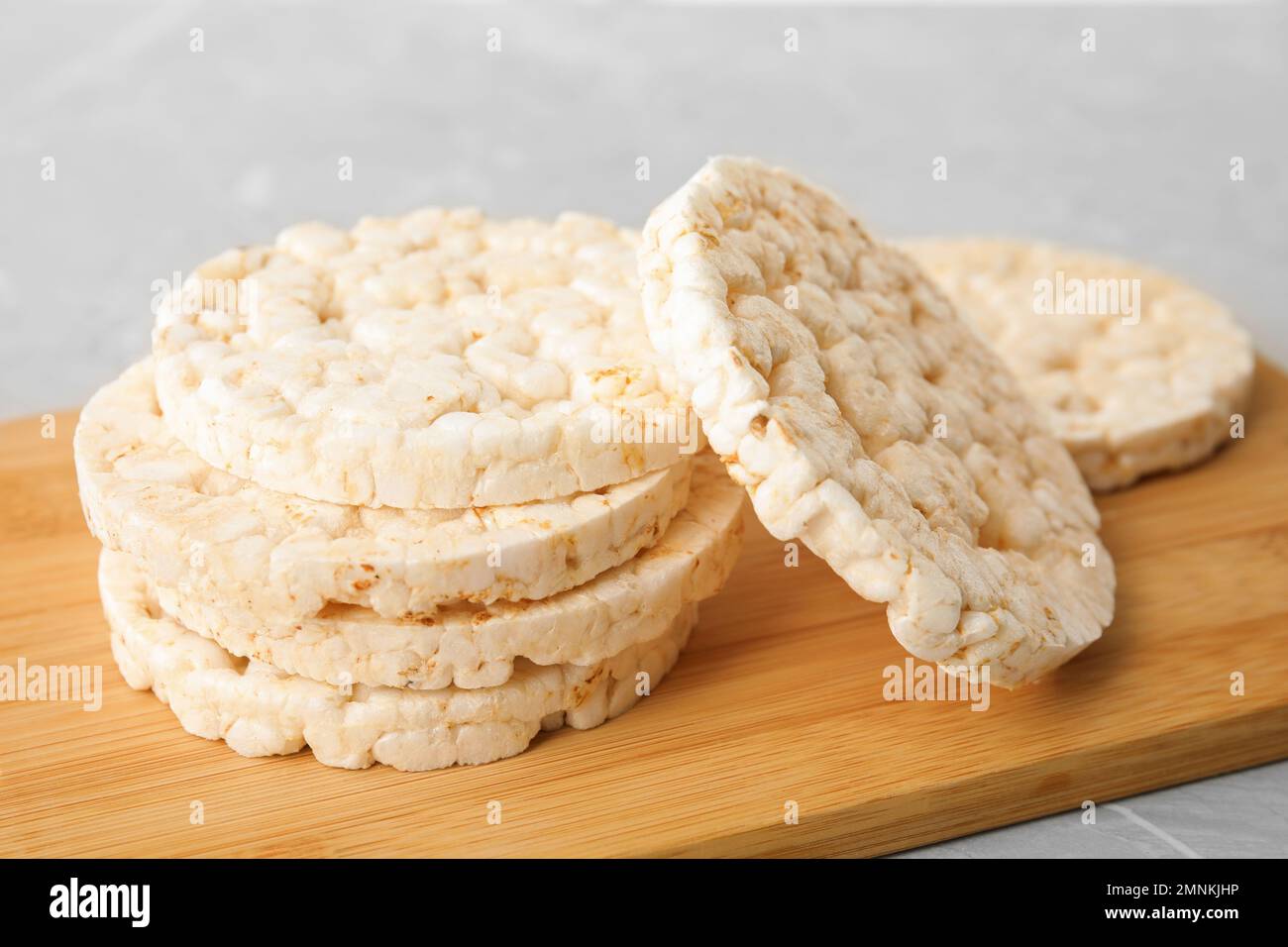 Stack of crunchy rice cakes on table, closeup Stock Photo - Alamy