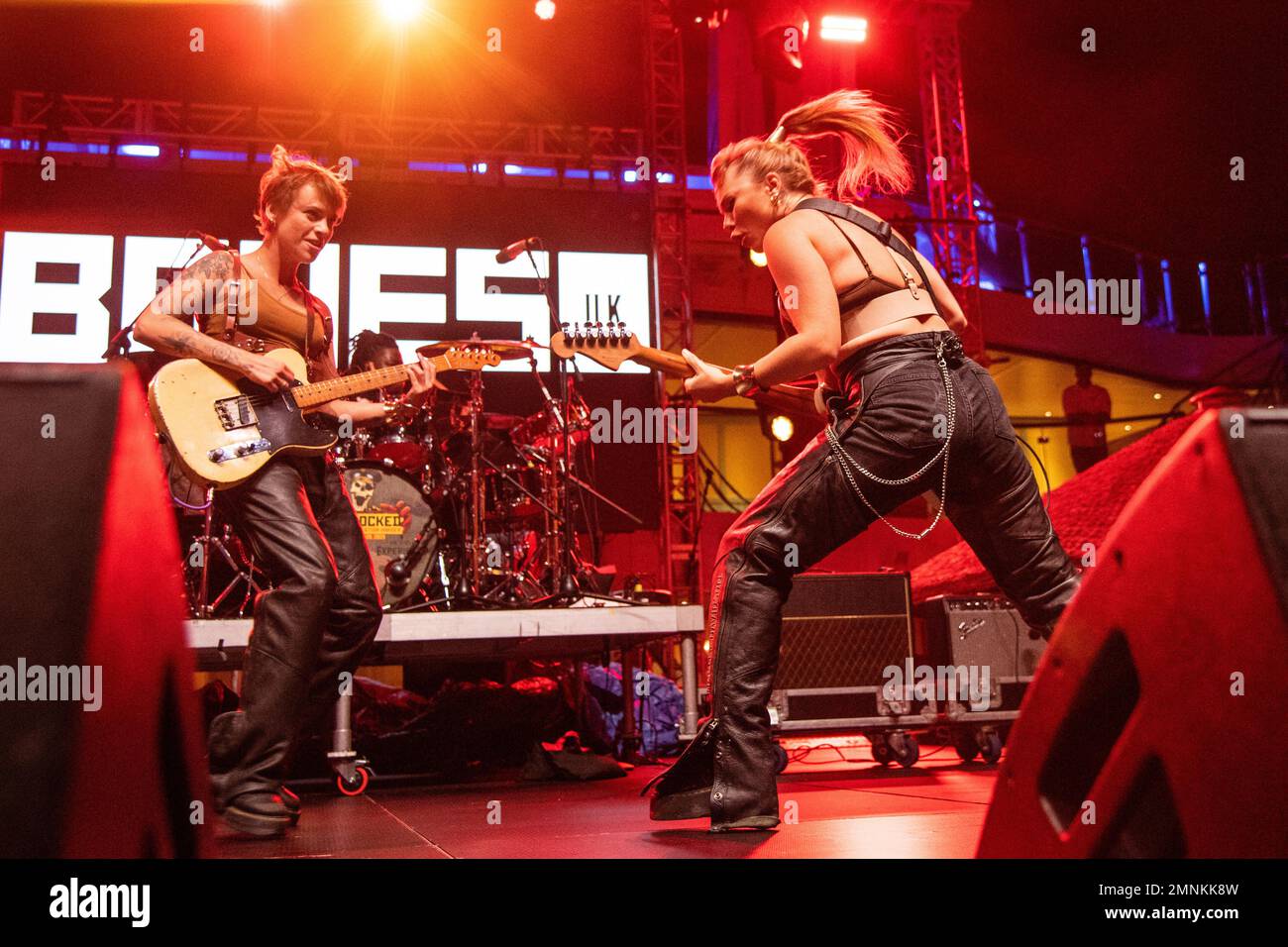 Carmen Vandenberg, left, and Rosie Bones of BONES UK perform on board the Carnival Magic during ...