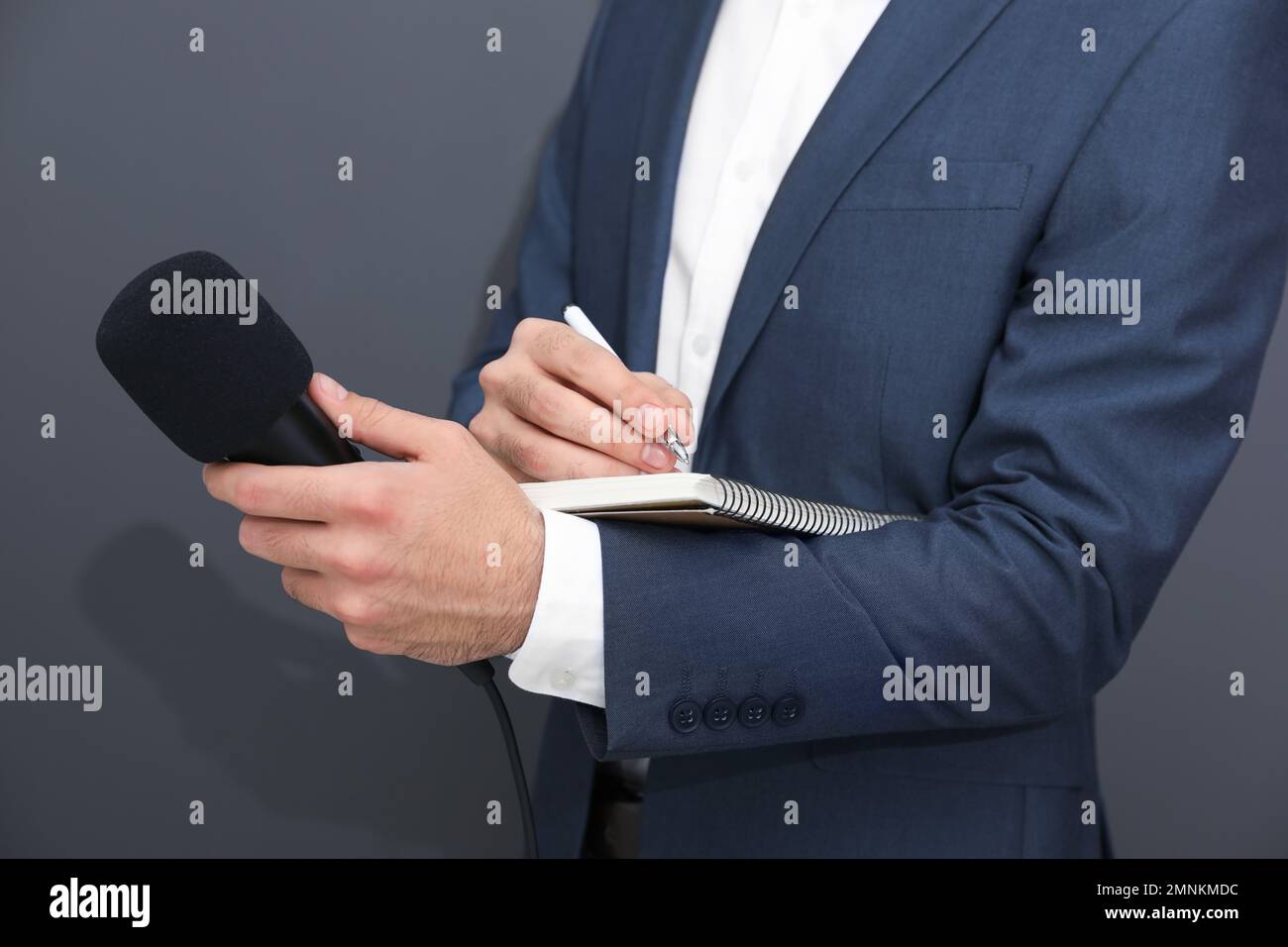 News Journalist Taking Notes