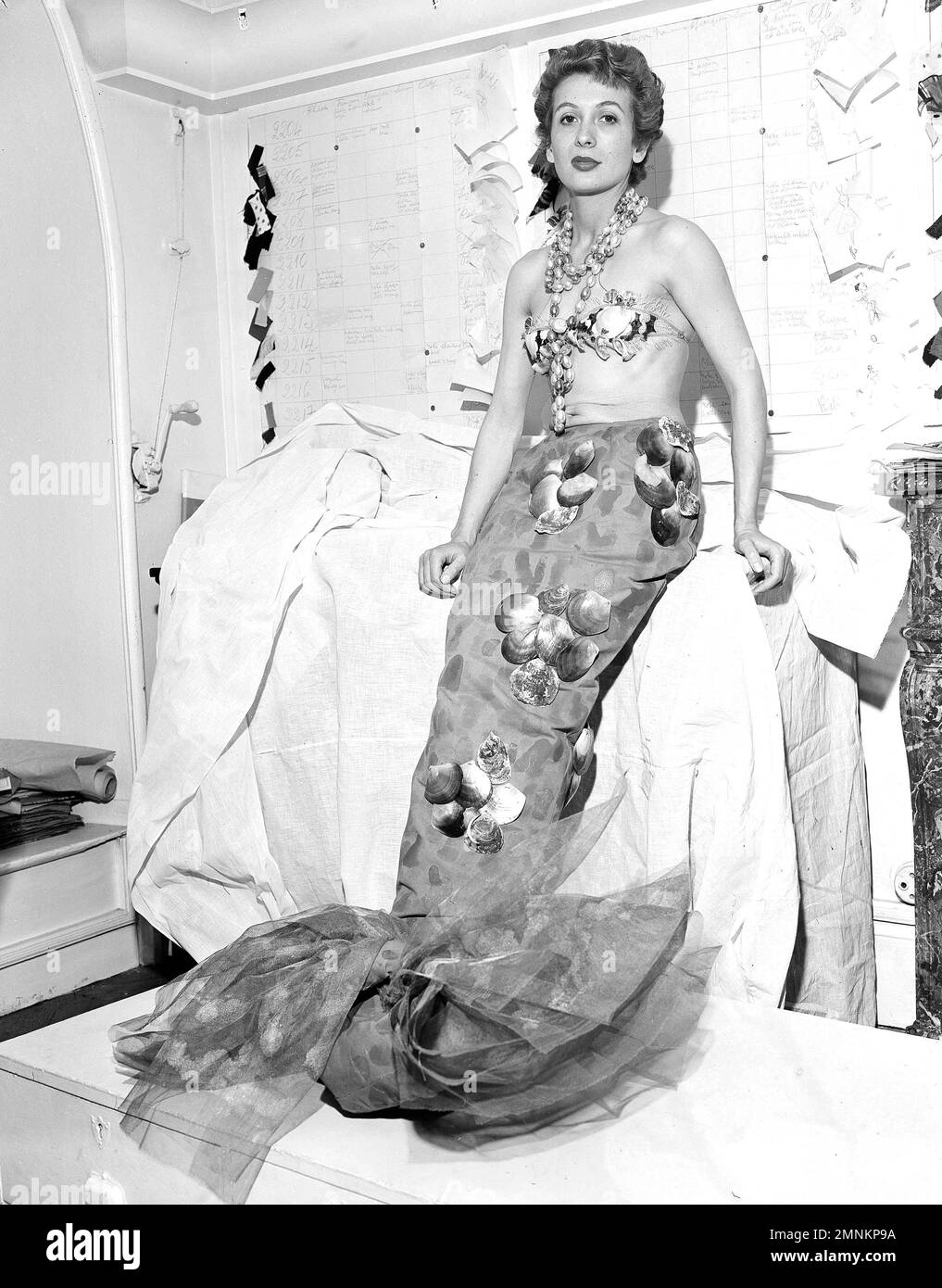 French actress Gaby Sylvia sits mermaid costume at Schiaparelli's ...