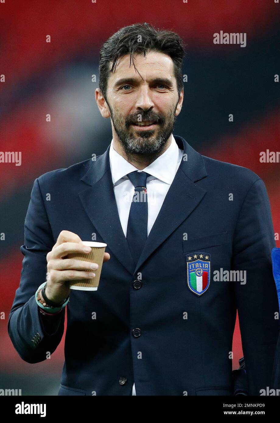 Italian's goalkeeper Gianluigi Buffon holds a cup during a walkaround ...
