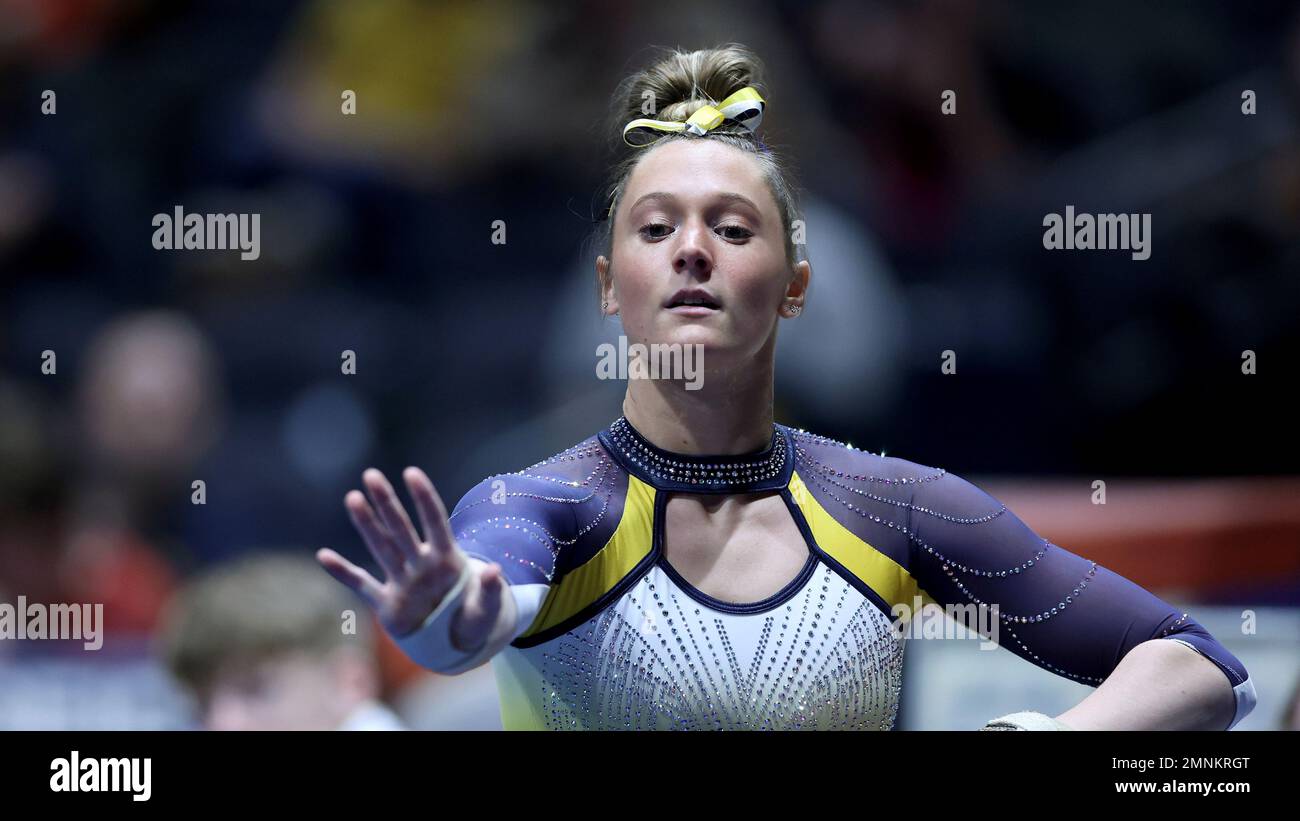 West Virginia's Emily Holmes-Hacker competes on floor during an NCAA ...