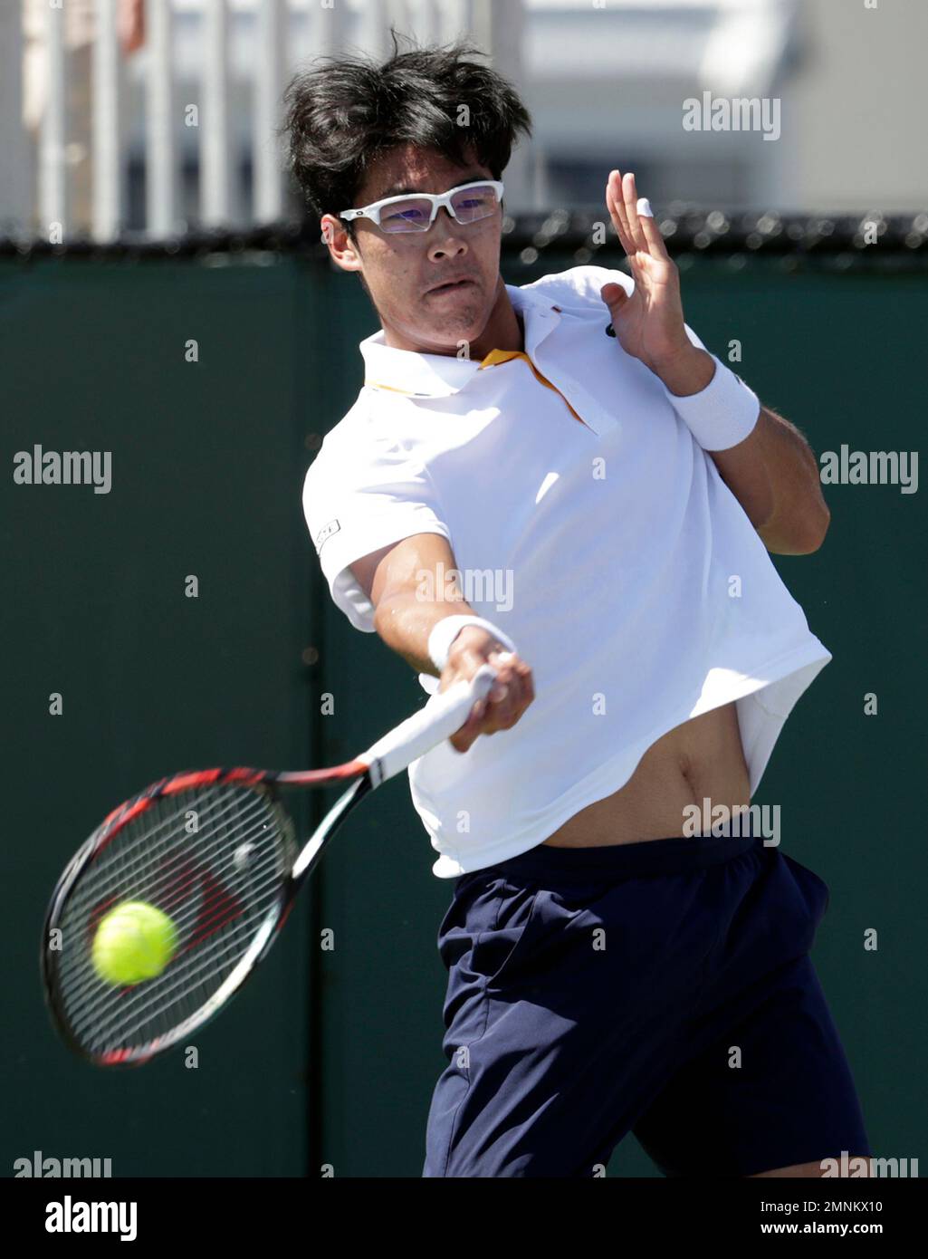 Hyeon Chung, of South Korea, returns to Michael Mmoh, during the Miami ...