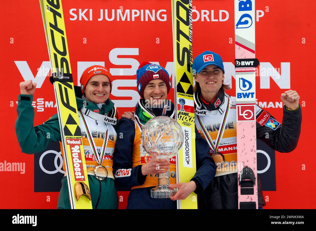 CORRECTS NAME Overall ski flying winner Poland's Kamil Stoch, center ...