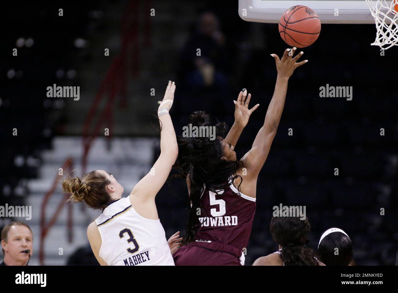 Texas A&M forward Anriel Howard (5) shoots in front of Notre Dame guard ...