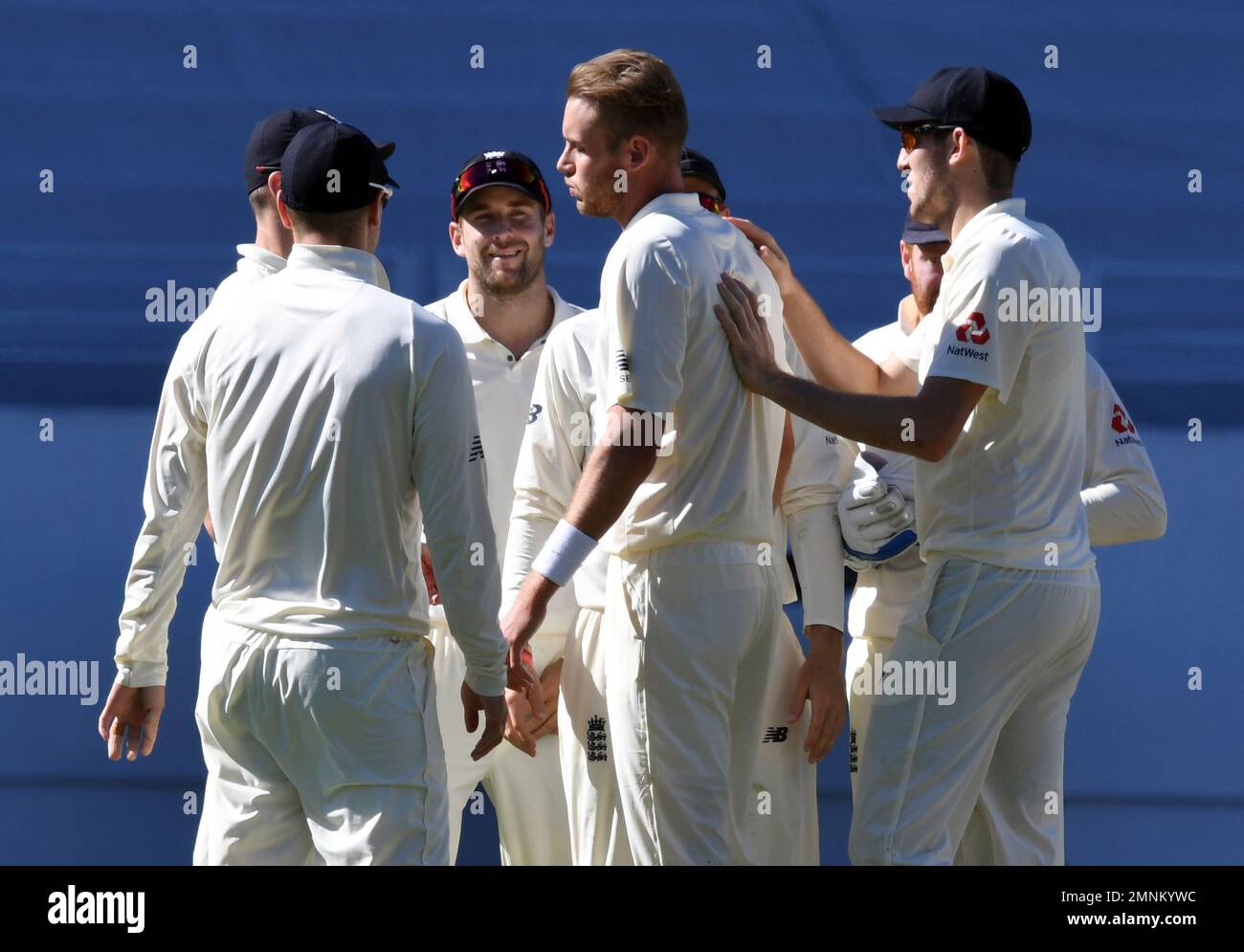 England's Stuart Broad, center, reacts after dismissing New Zealand's ...