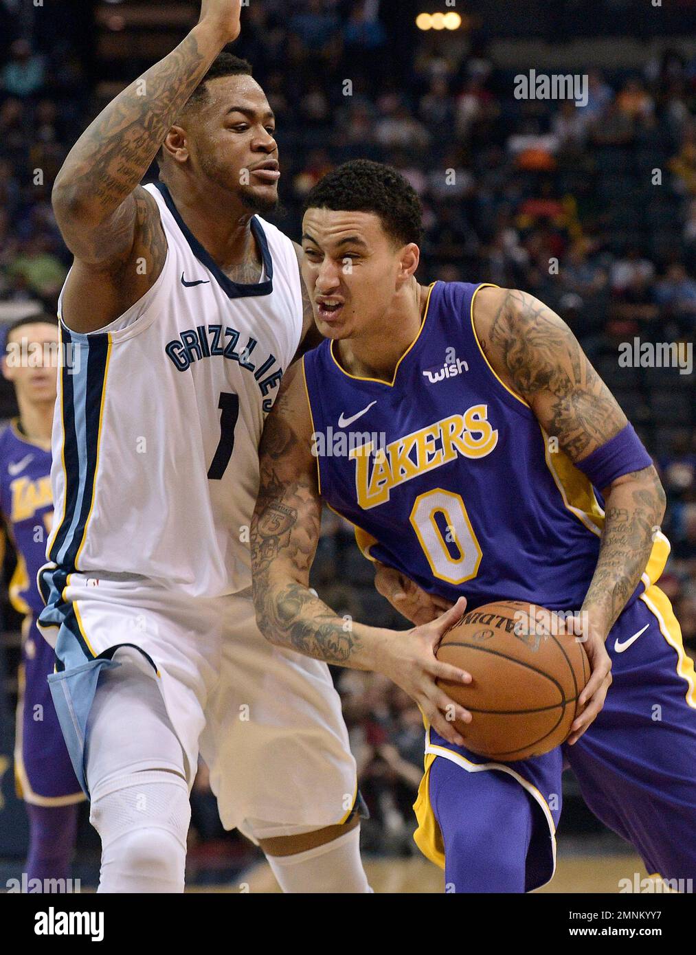 Los Angeles Lakers forward Kyle Kuzma (0) drives against Memphis ...