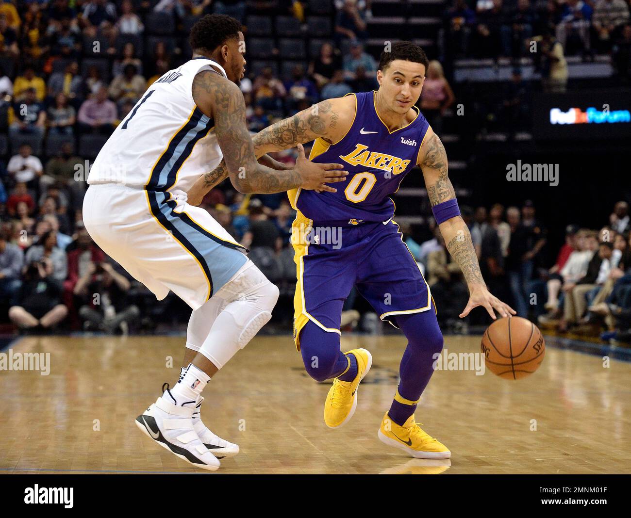 Los Angeles Lakers forward Kyle Kuzma (0) drives against Memphis ...