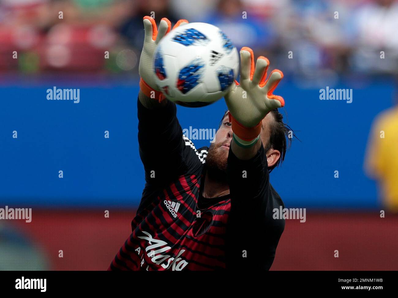 Portland Timbers goalkeeper Jake Gleeson (90) blocks a shot from FC ...
