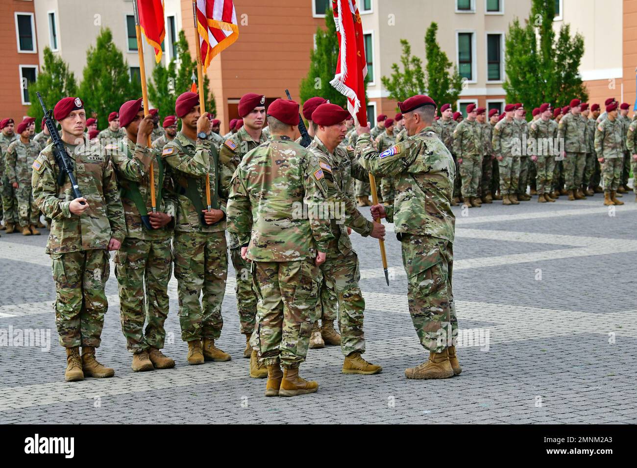 U.S. Army Master Sgt. Wesley E. Shields, passes the colors to Lt. Col ...