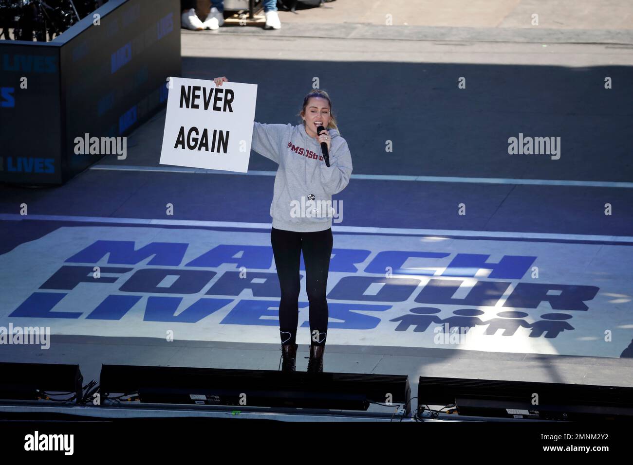 Miley Cyrus performs "The Climb" during the "March for Our Lives" rally ...