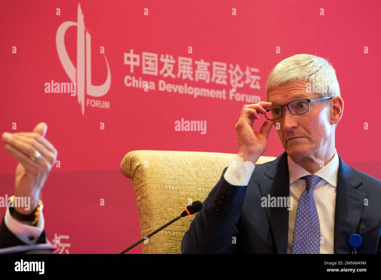 Tim Cook, Apple CEO, speaks at a economic summit a day before the China ...