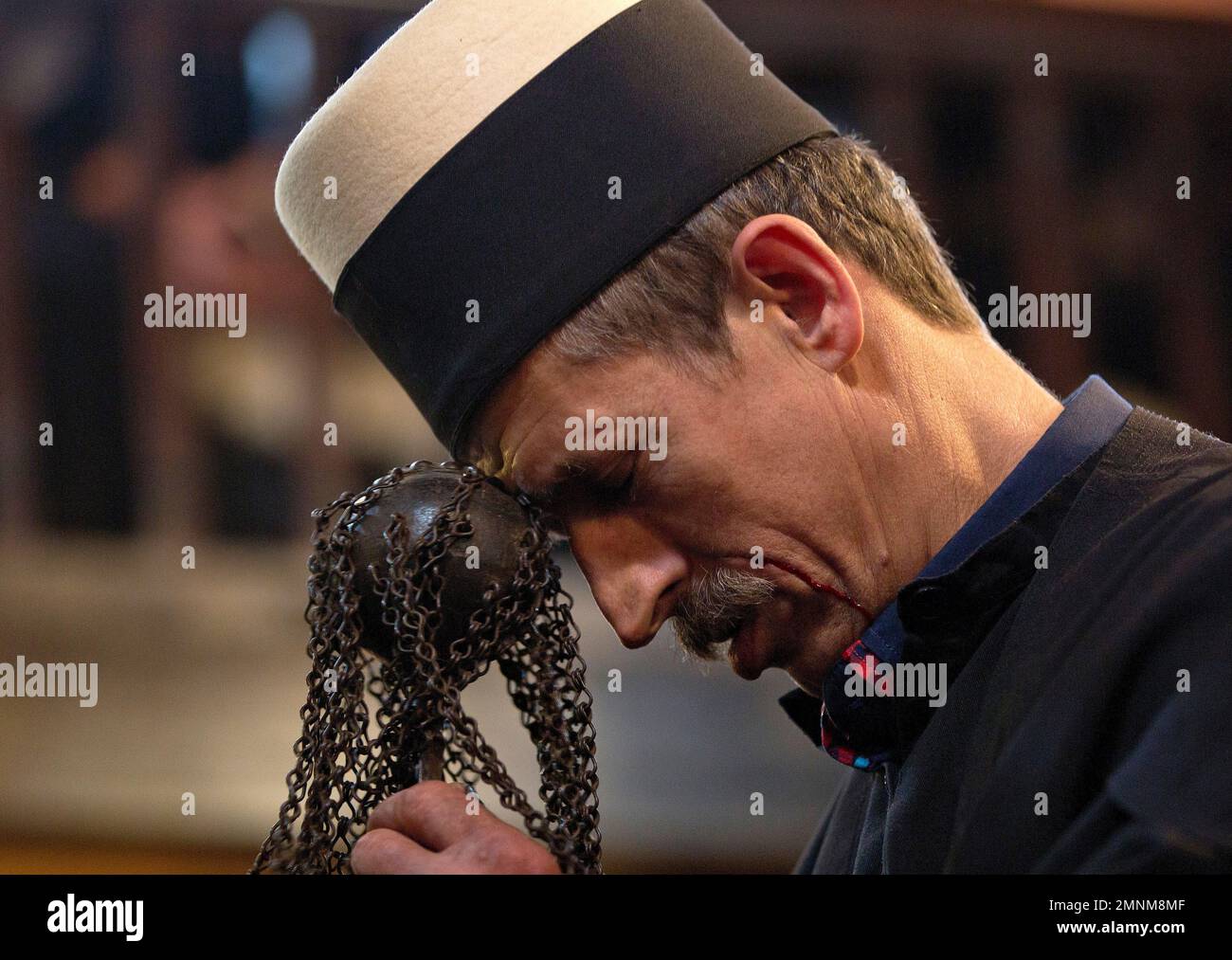 A Kosovo dervish, a follower of Sufism a mystical form of Islam that ...