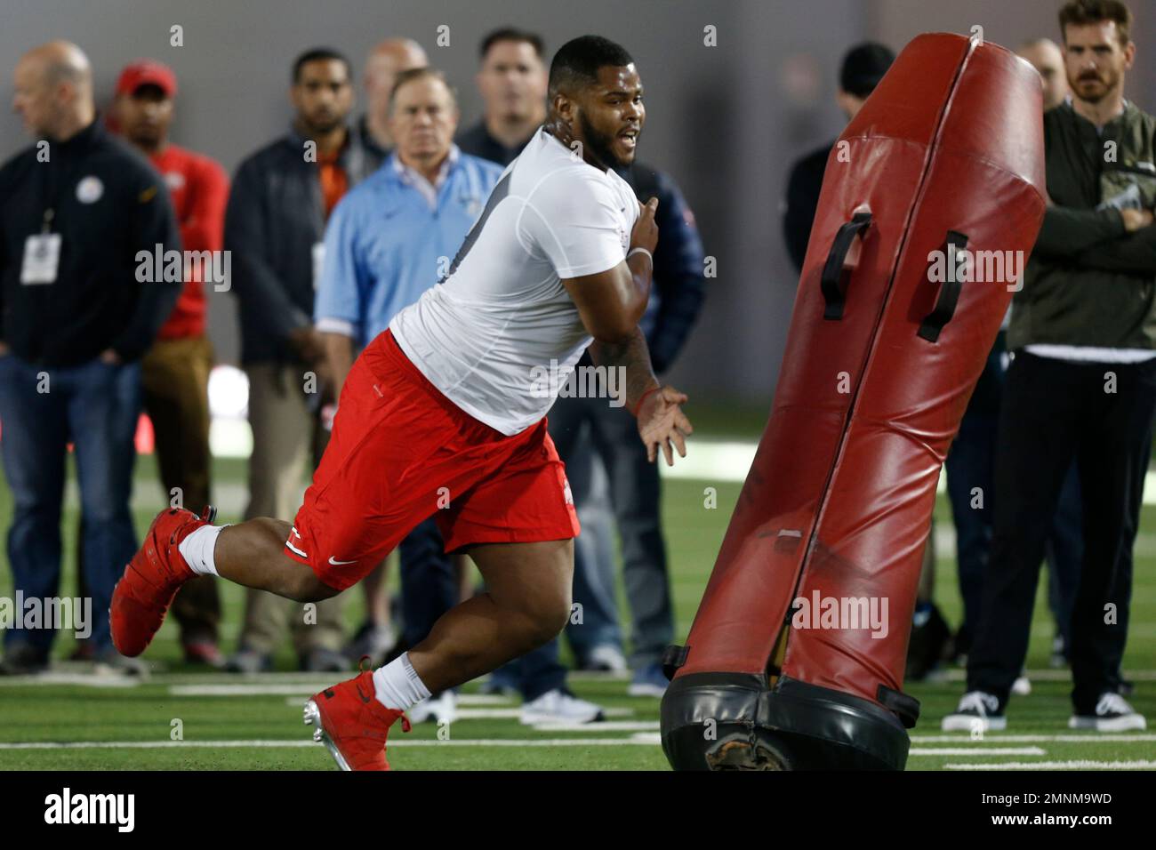 Defensive lineman Michael Hill runs a drill during Ohio State's NFL Pro ...