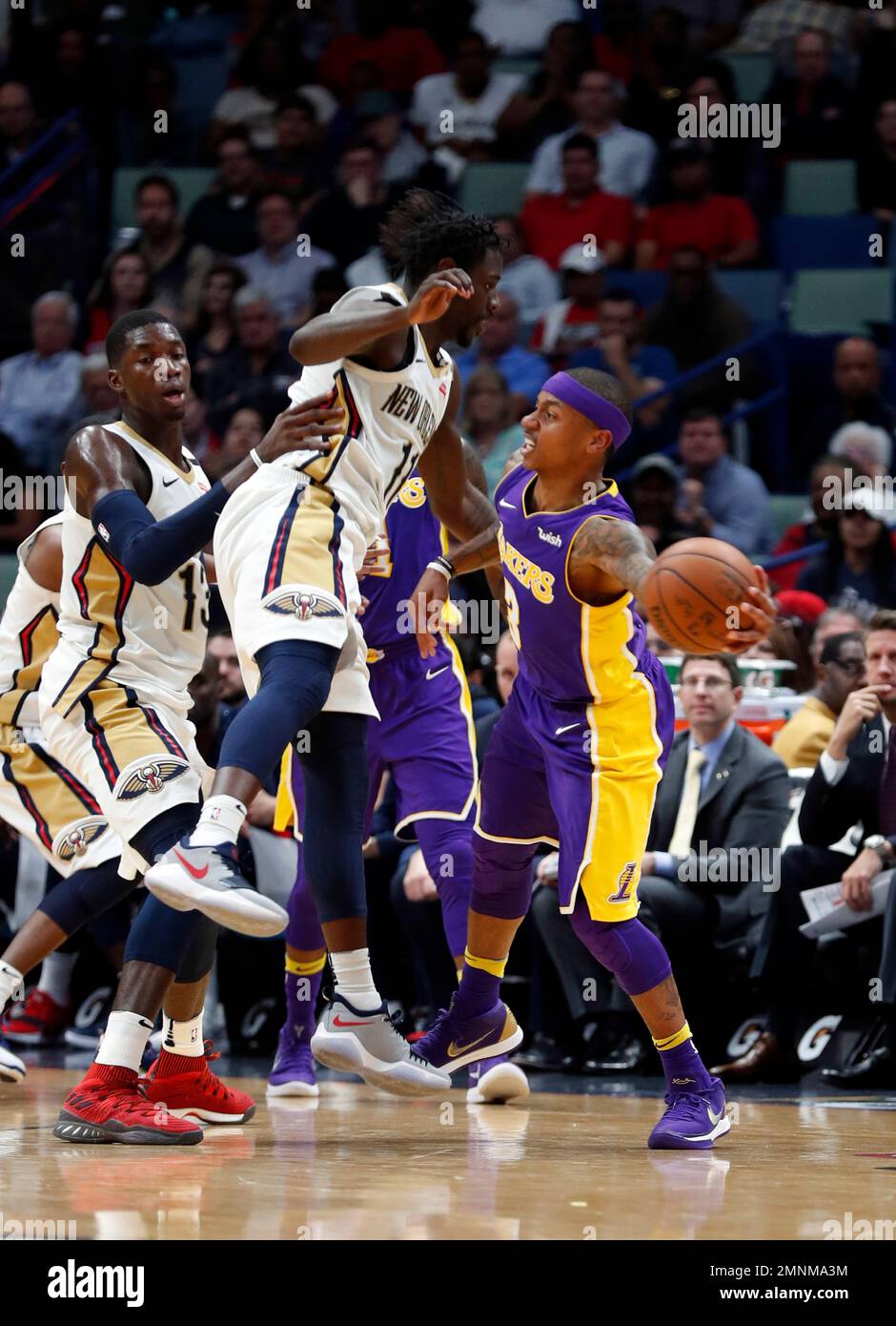 Los Angeles Lakers guard Isaiah Thomas trues to pass around New Orleans ...