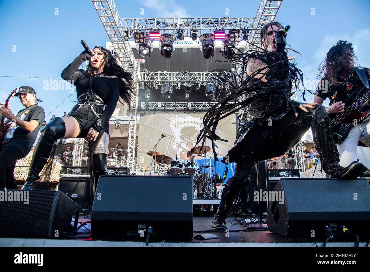 Alecia 'Mixi' Demner, left, and Davey Suicide perform with The ...
