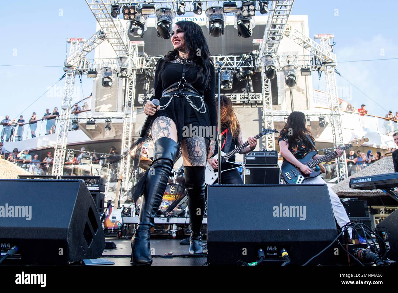 Alecia 'Mixi' Demner performs with The Stowaways on board the Carnival ...